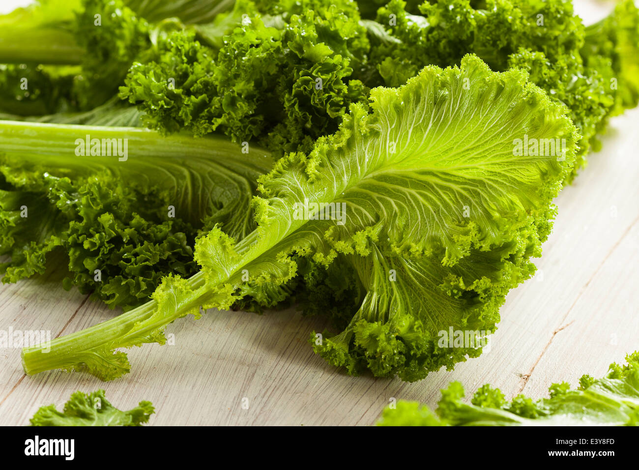 Organic Raw Mustard Greens on a Background Stock Photo - Alamy