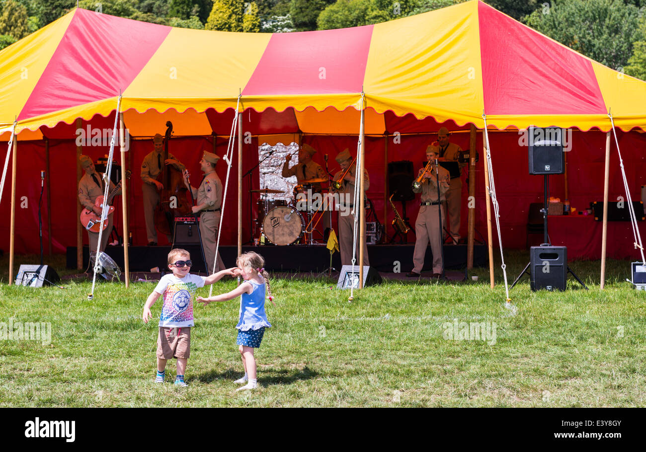 East Devon, England. A Fete and garden party with a group playing ...