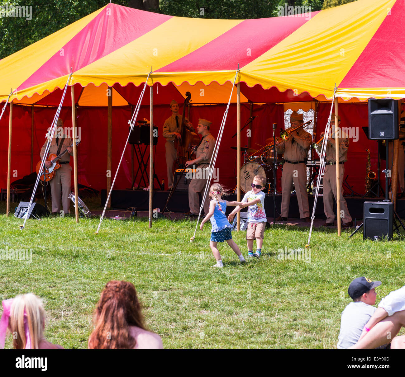 East Devon, England. A Fete and garden party with a group playing ...