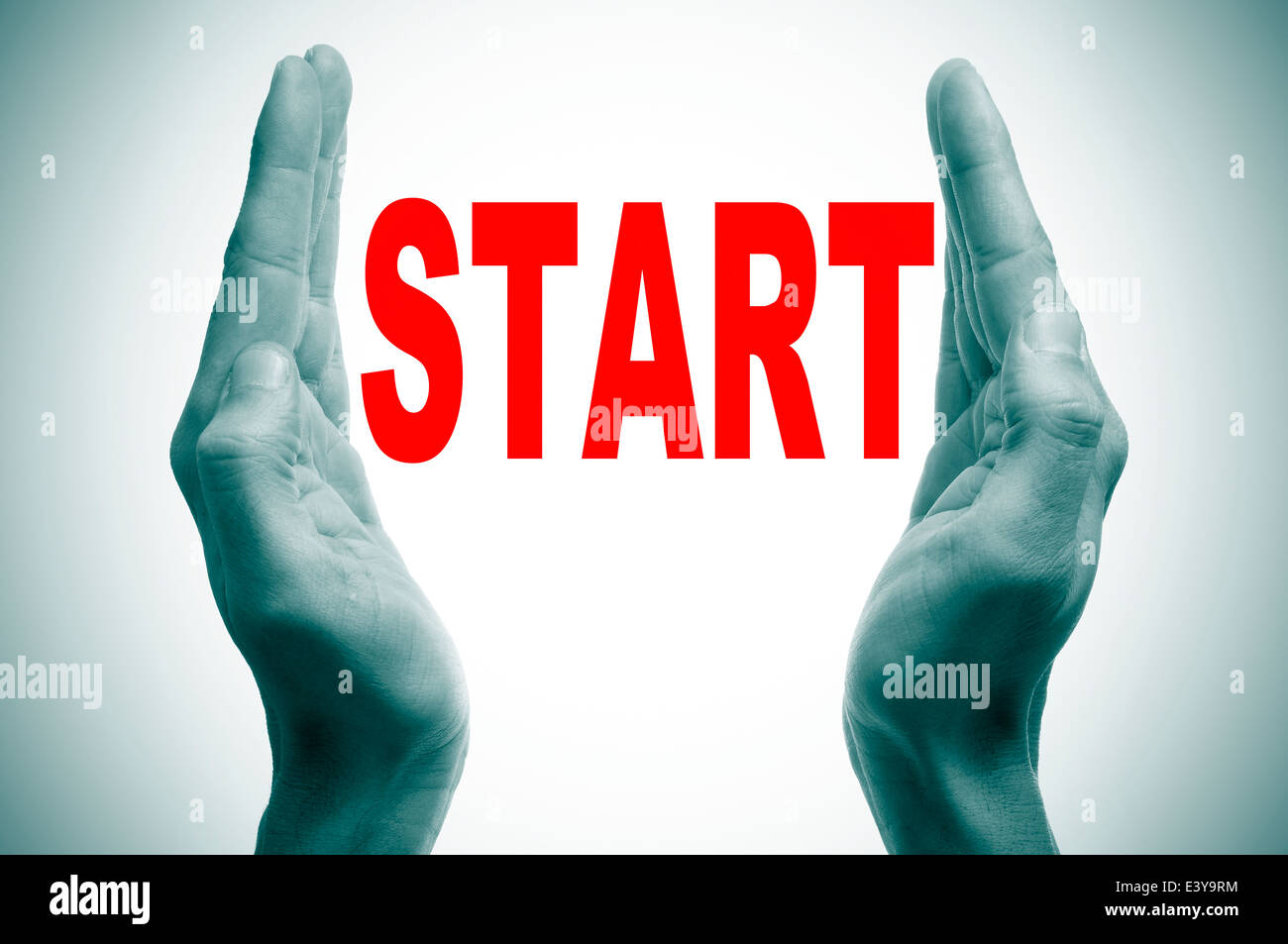 man hands forming brackets and the word start written in the space ...