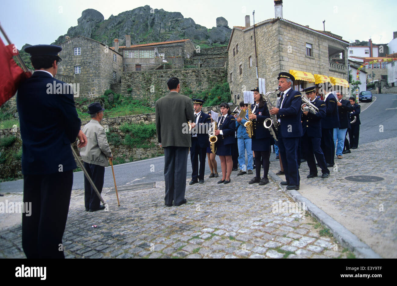 A band performance kicks off a village celebration in Monsanto Beiras ...