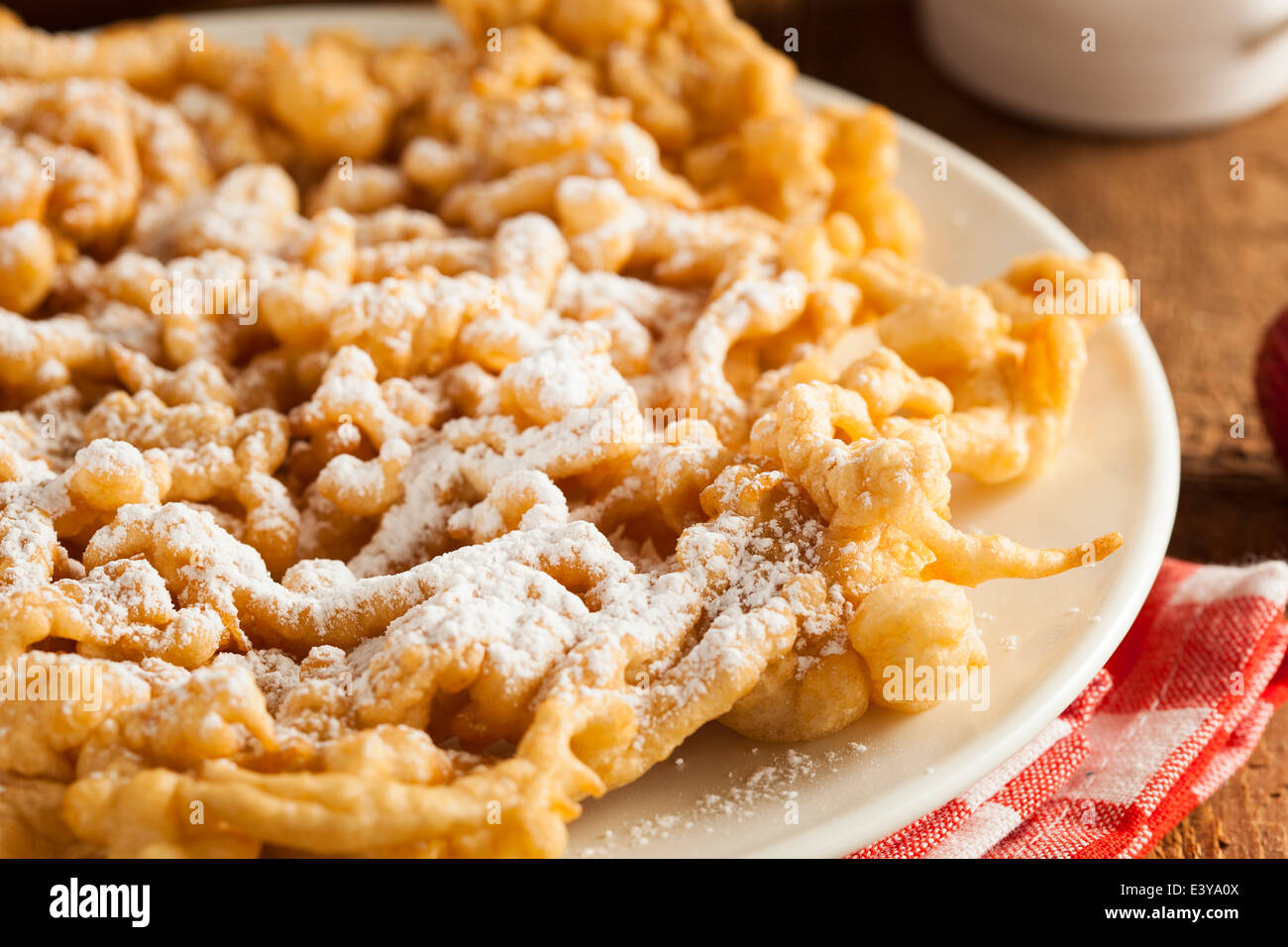 Homemade Funnel Cake with Powdered Sugar at the Fair Stock Photo - Alamy