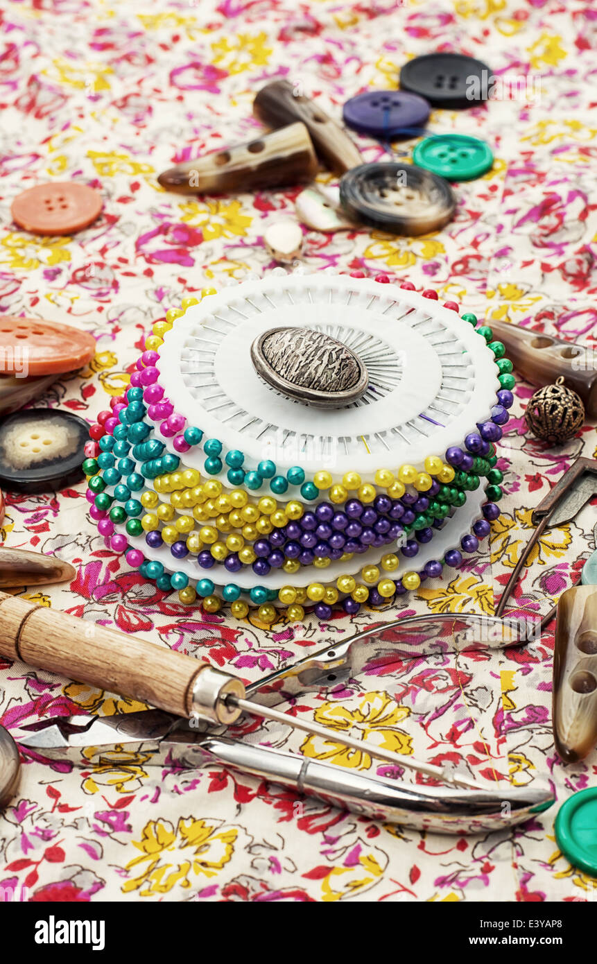 different buttons and zipper on the background of sewing tool Stock ...
