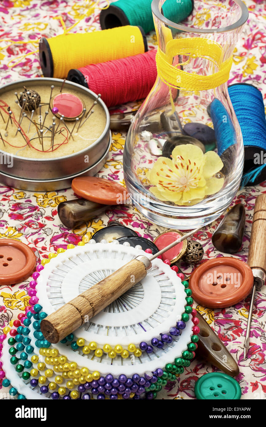 different buttons and zipper on the background of sewing tool Stock ...