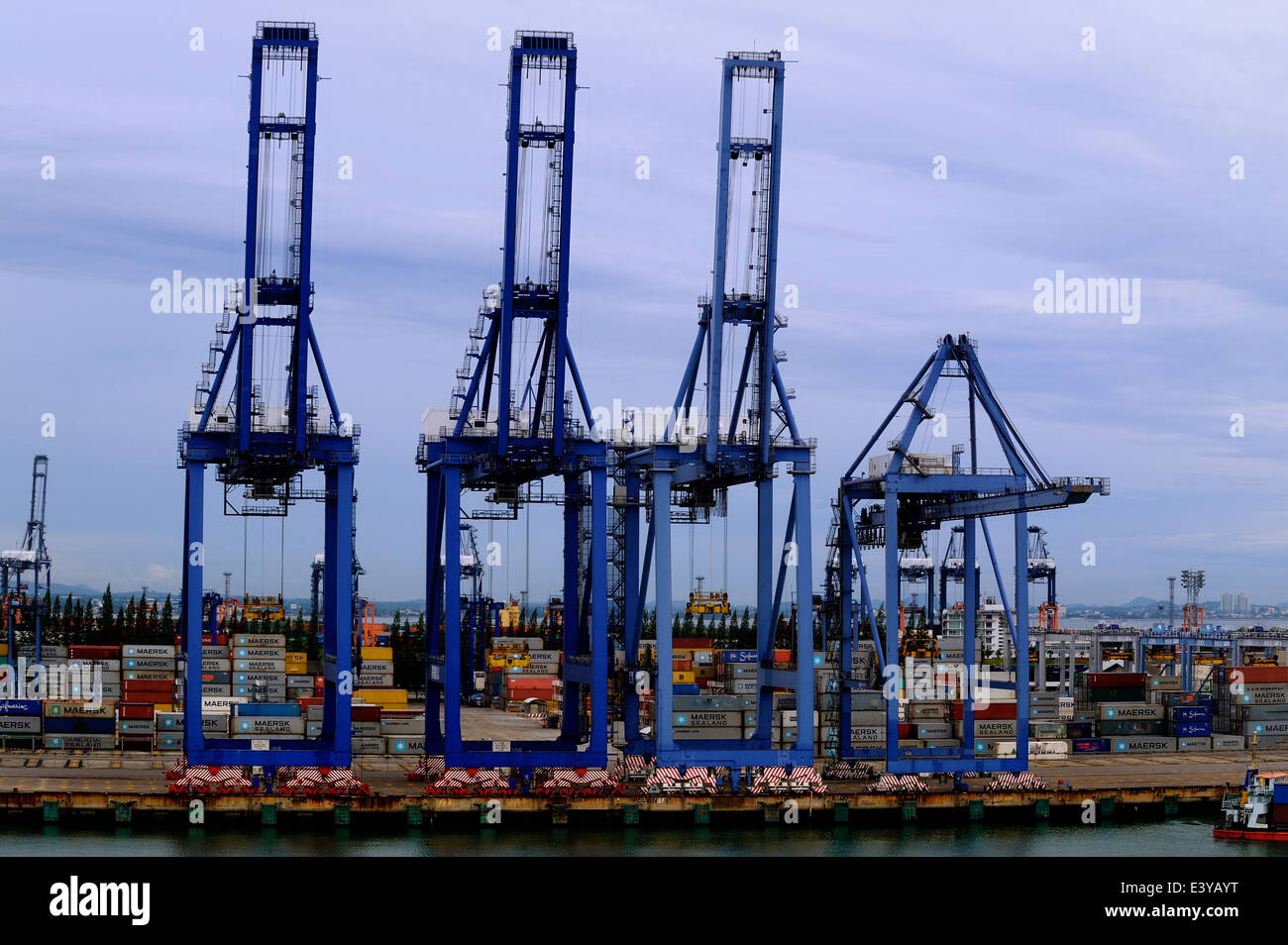 Four container cranes hi-res stock photography and images - Alamy