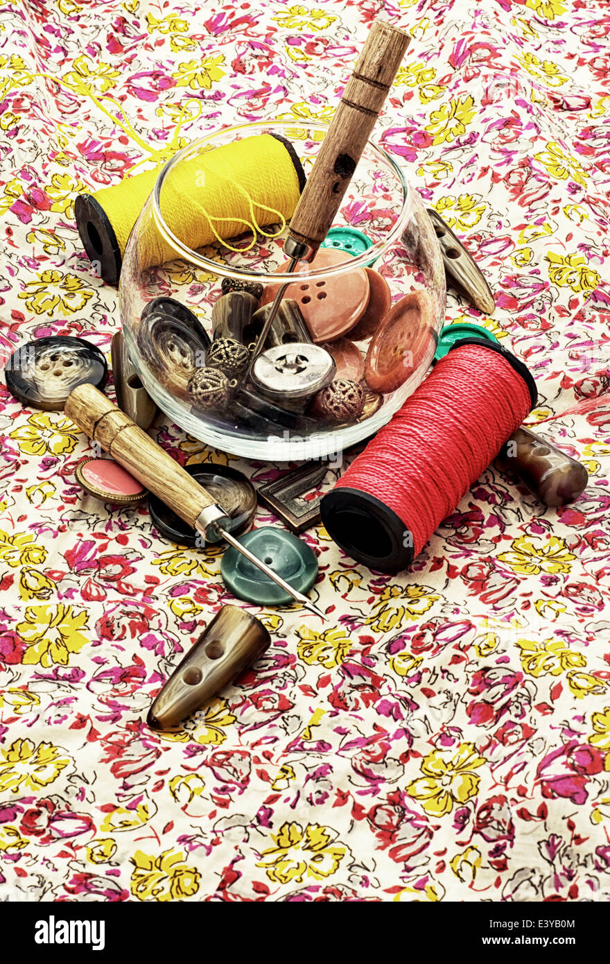 different buttons and zipper on the background of sewing tool Stock ...