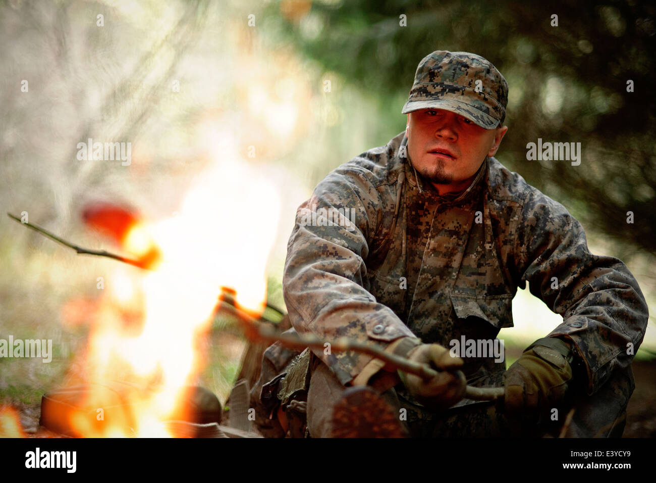 Man camping in the woods Stock Photo - Alamy