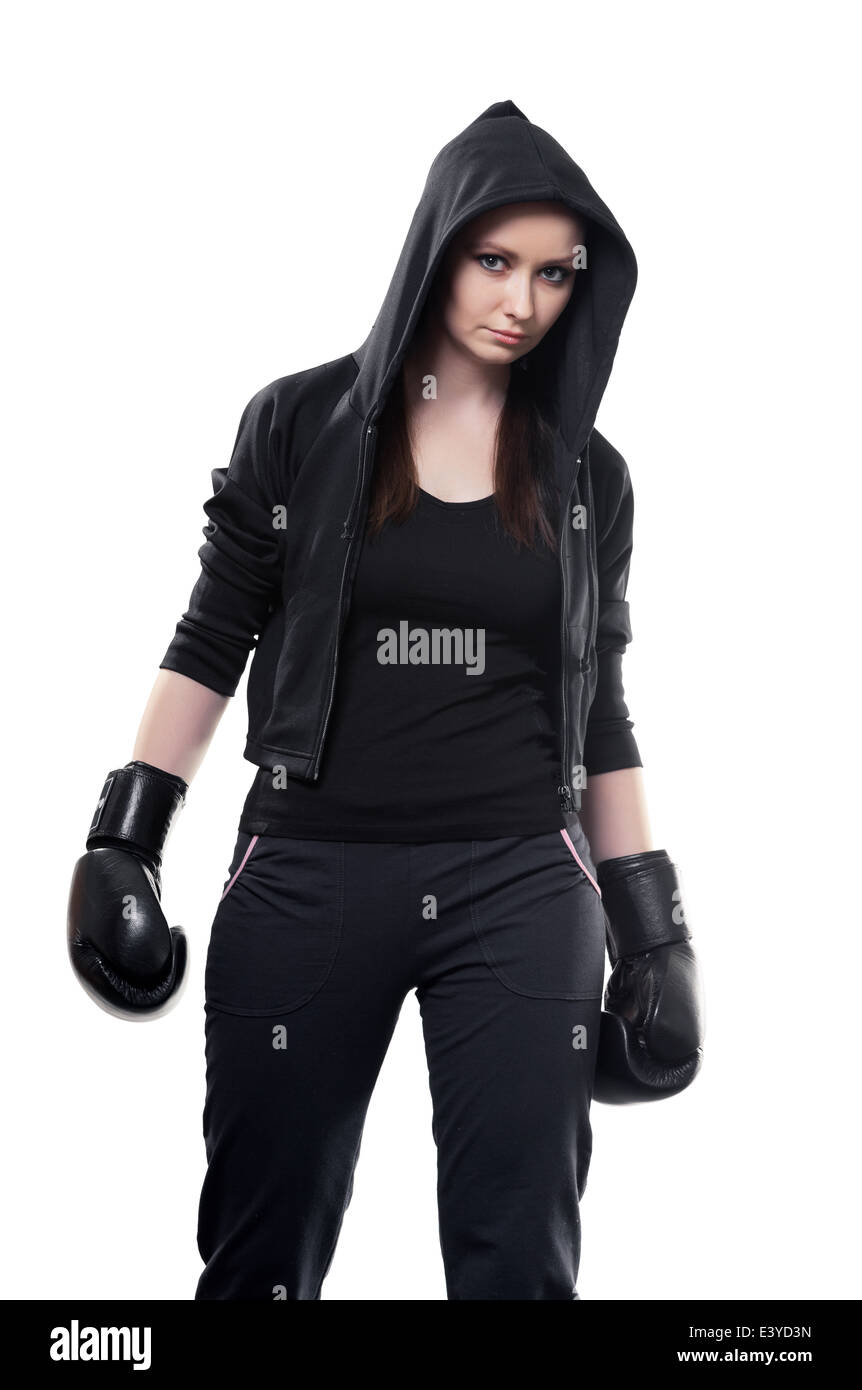 Young serious woman in boxing gloves on a white background Stock Photo ...