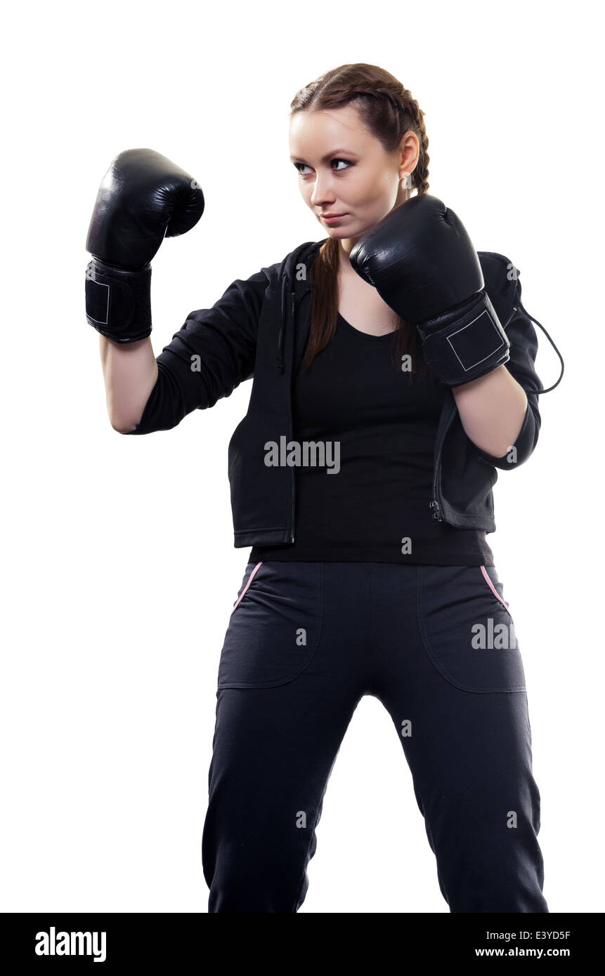 Young serious woman in boxing gloves on a white background Stock Photo ...