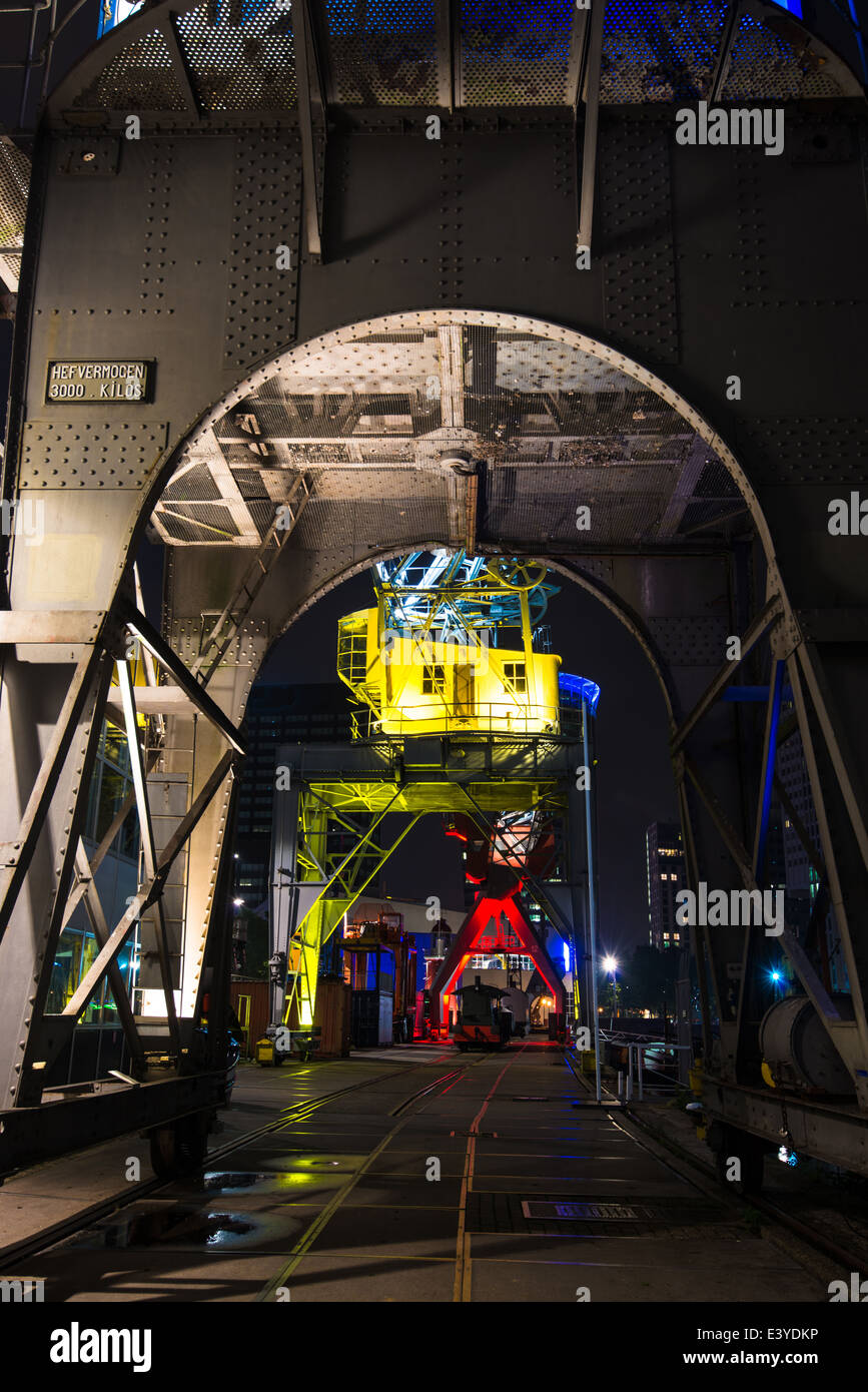 Illuminated cranes at night Stock Photo - Alamy