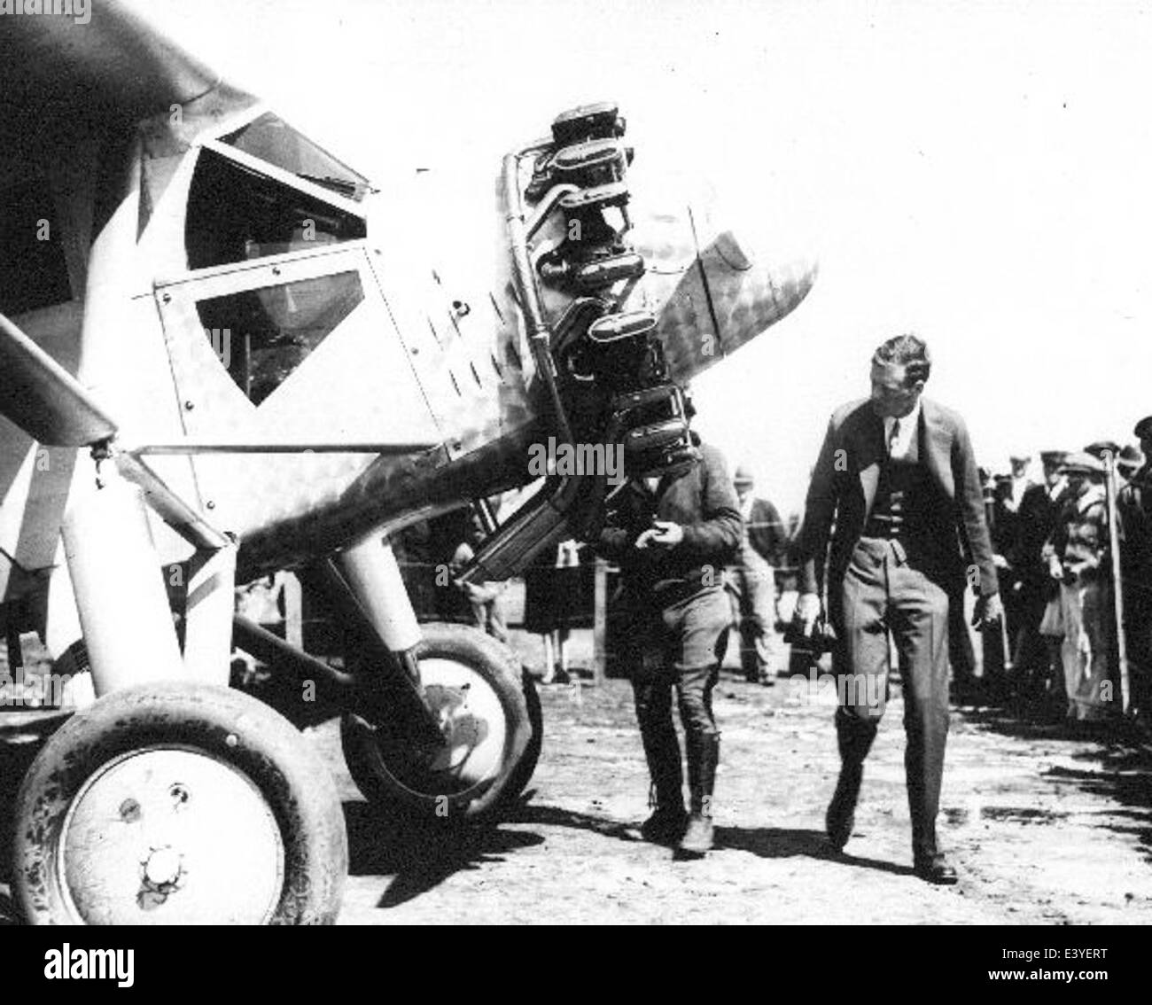 A 1927 photograph of Charles Lindbergh and his Ryan Brougham aircraft ...
