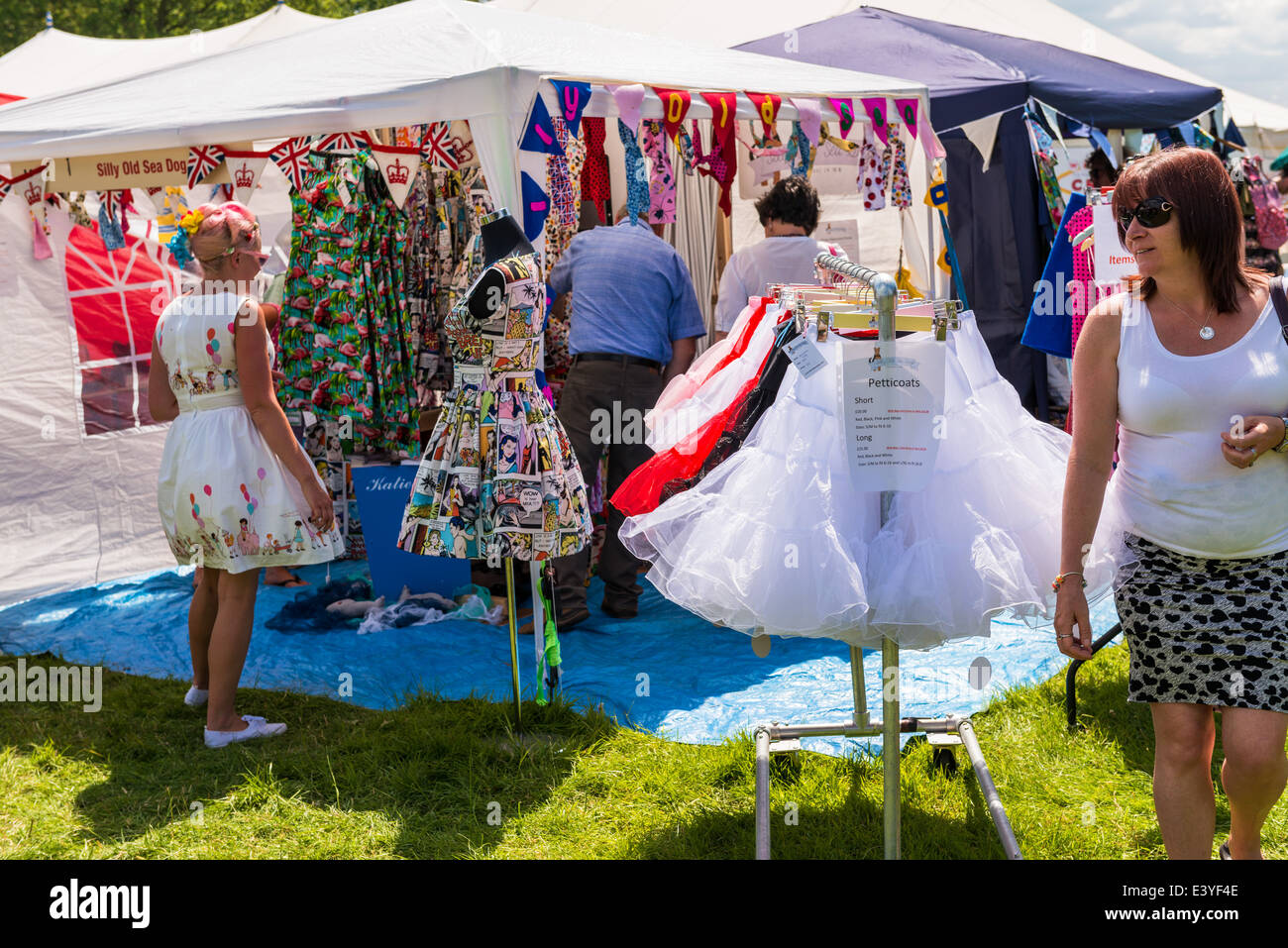 East Devon, England. A clothes stall at a Fete and garden party selling ...