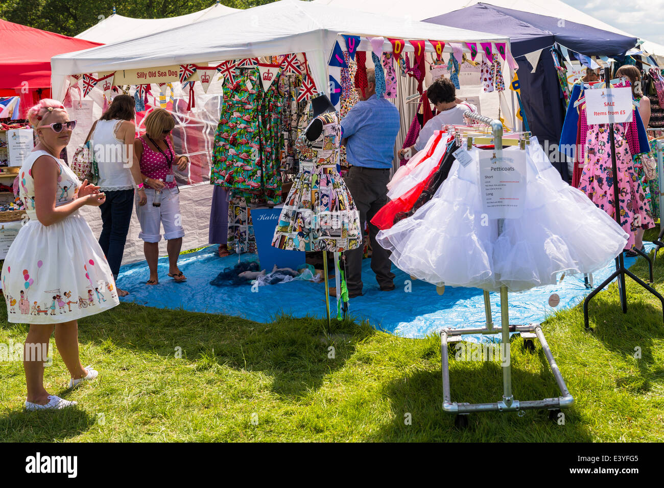 East Devon, England. A clothes stall at a Fete and garden party selling ...