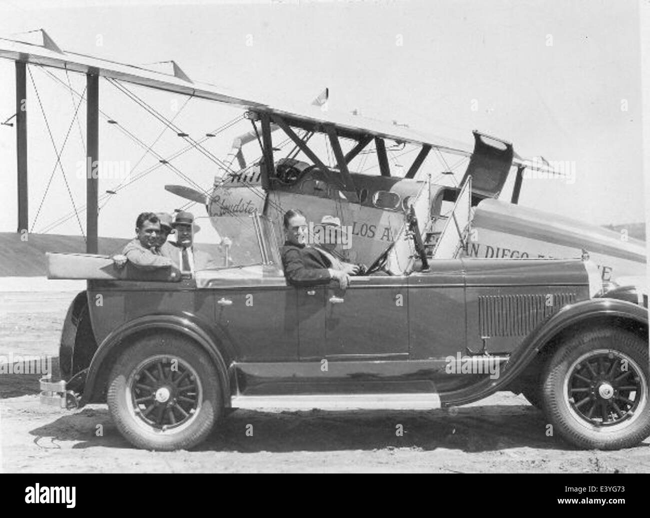 A 1926 photograph of Charles Lindbergh with a Ryan aircraft, reflecting ...