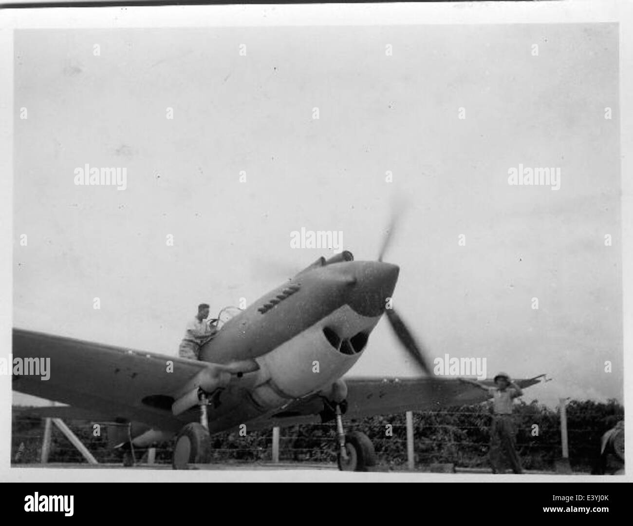 A photograph of a P-40 aircraft running up its engine, used by the ...