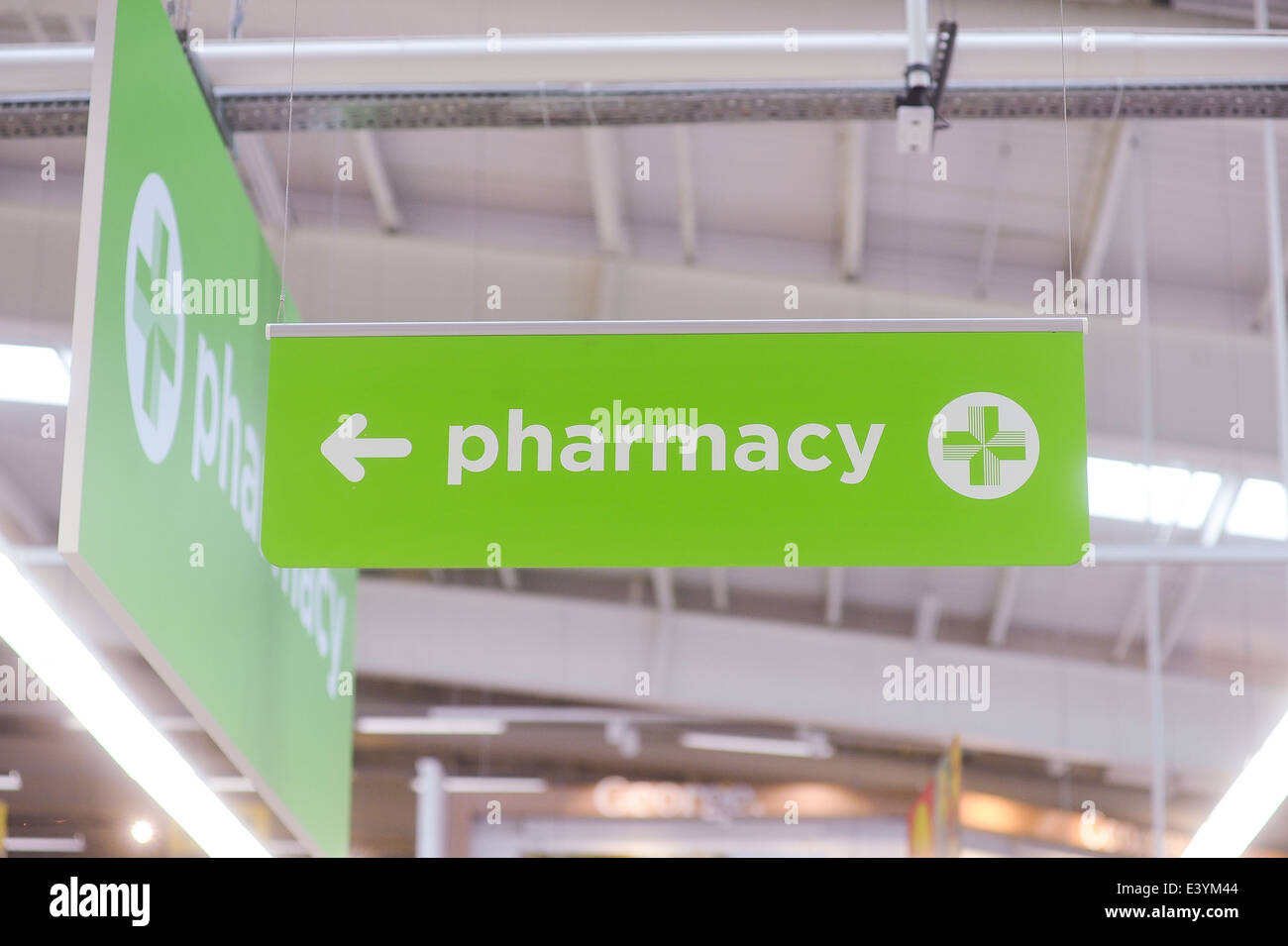 pharmacy sign at asda supermarket Stock Photo - Alamy