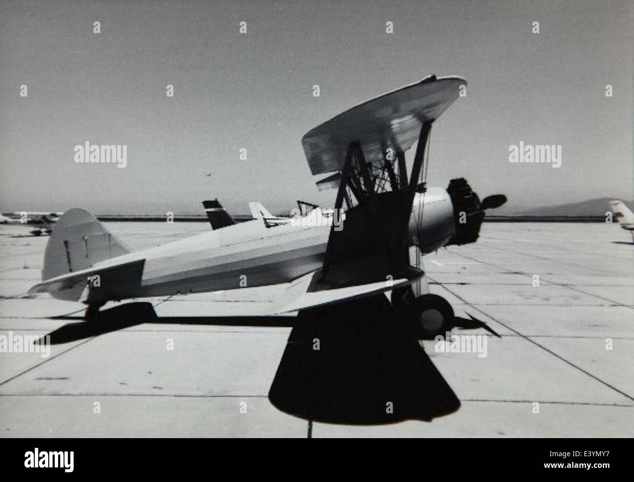 This photograph features the Stearman C-3R, a biplane used primarily ...