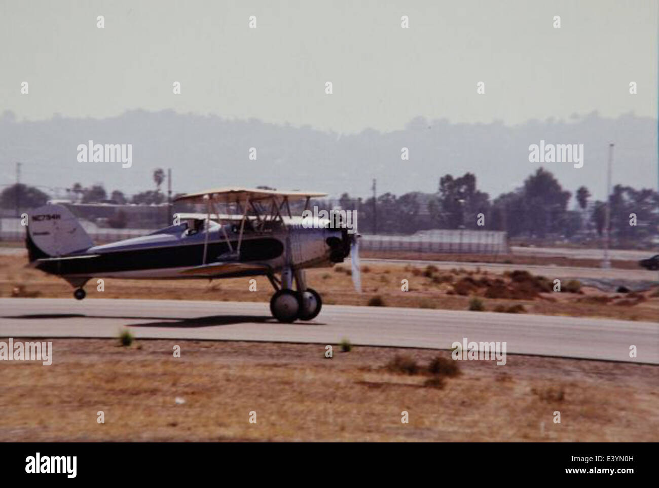 This photograph shows the Stearman C-3R, an early biplane used for ...