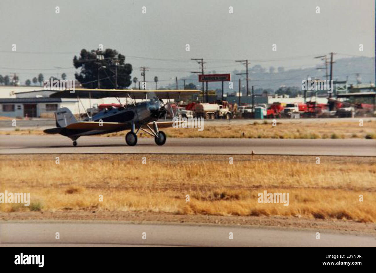 This photograph shows a Stearman C-3R, a biplane used in the 1930s for ...