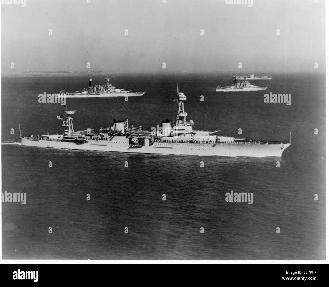 This photograph shows a North Hampton-class heavy cruiser, a part of ...