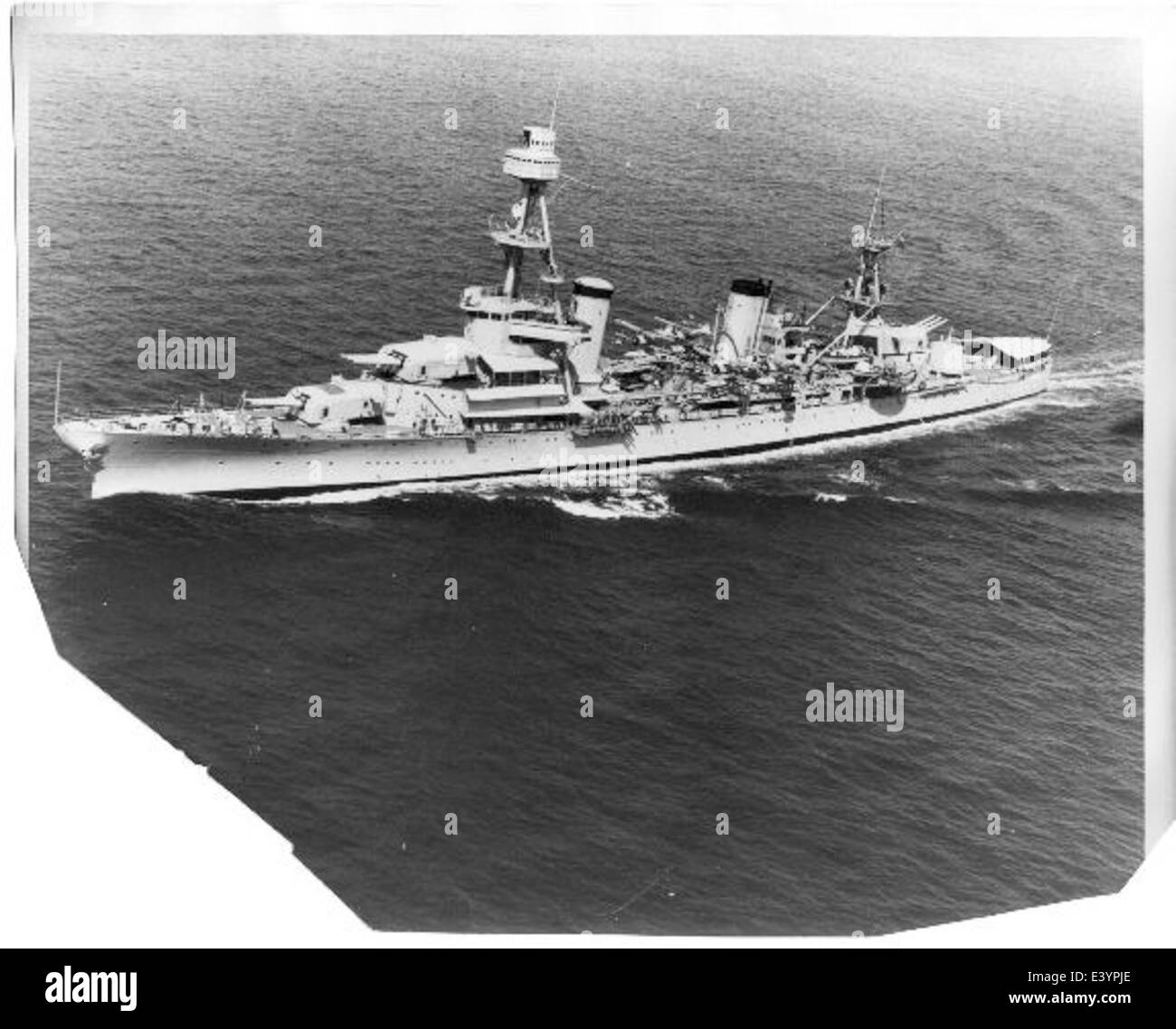 This photograph features the USS Pensacola (CA-24), a heavy cruiser of ...