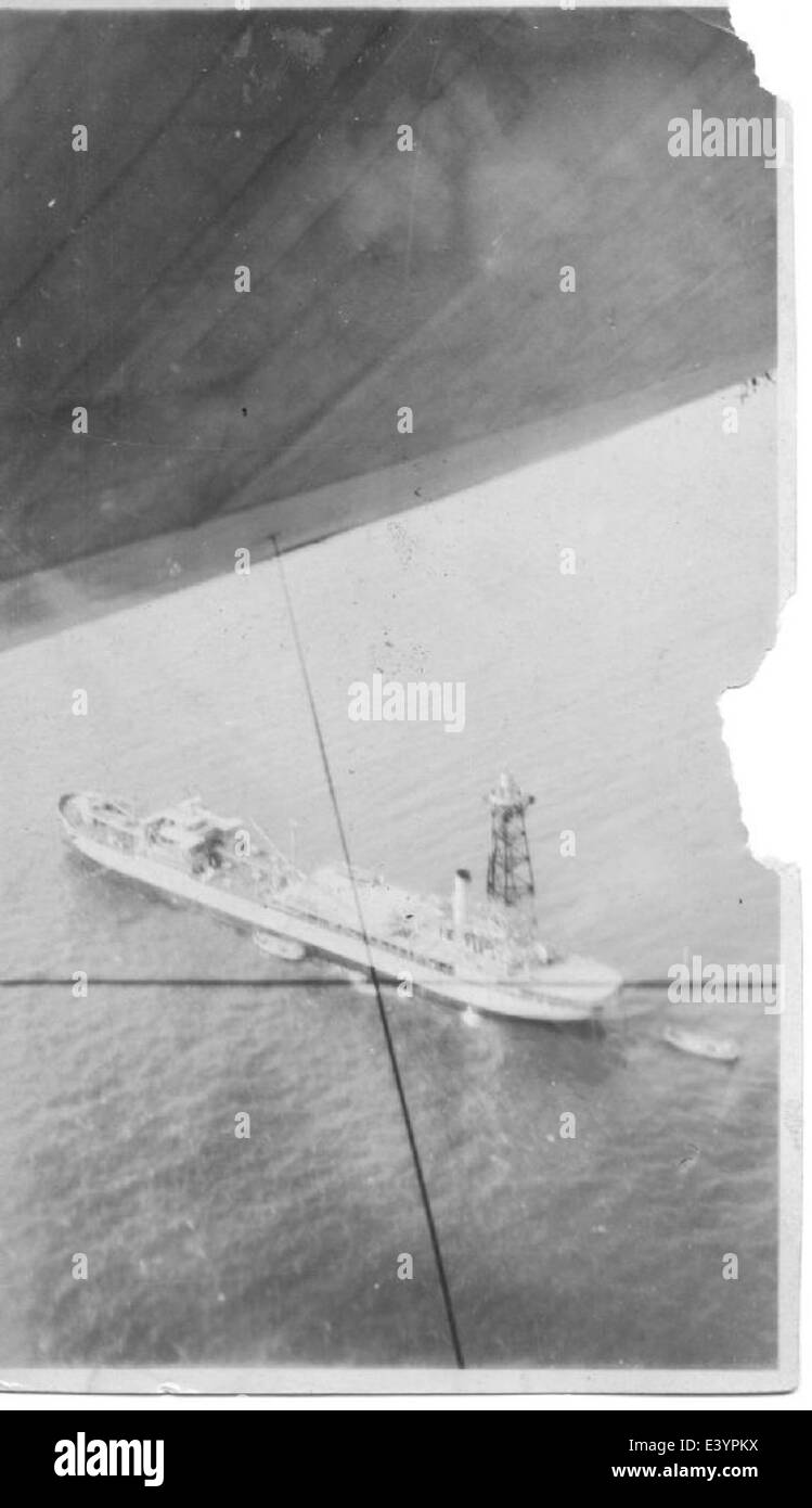 A photograph of the AO-9, a U.S. Navy oiler ship, involved in refueling ...