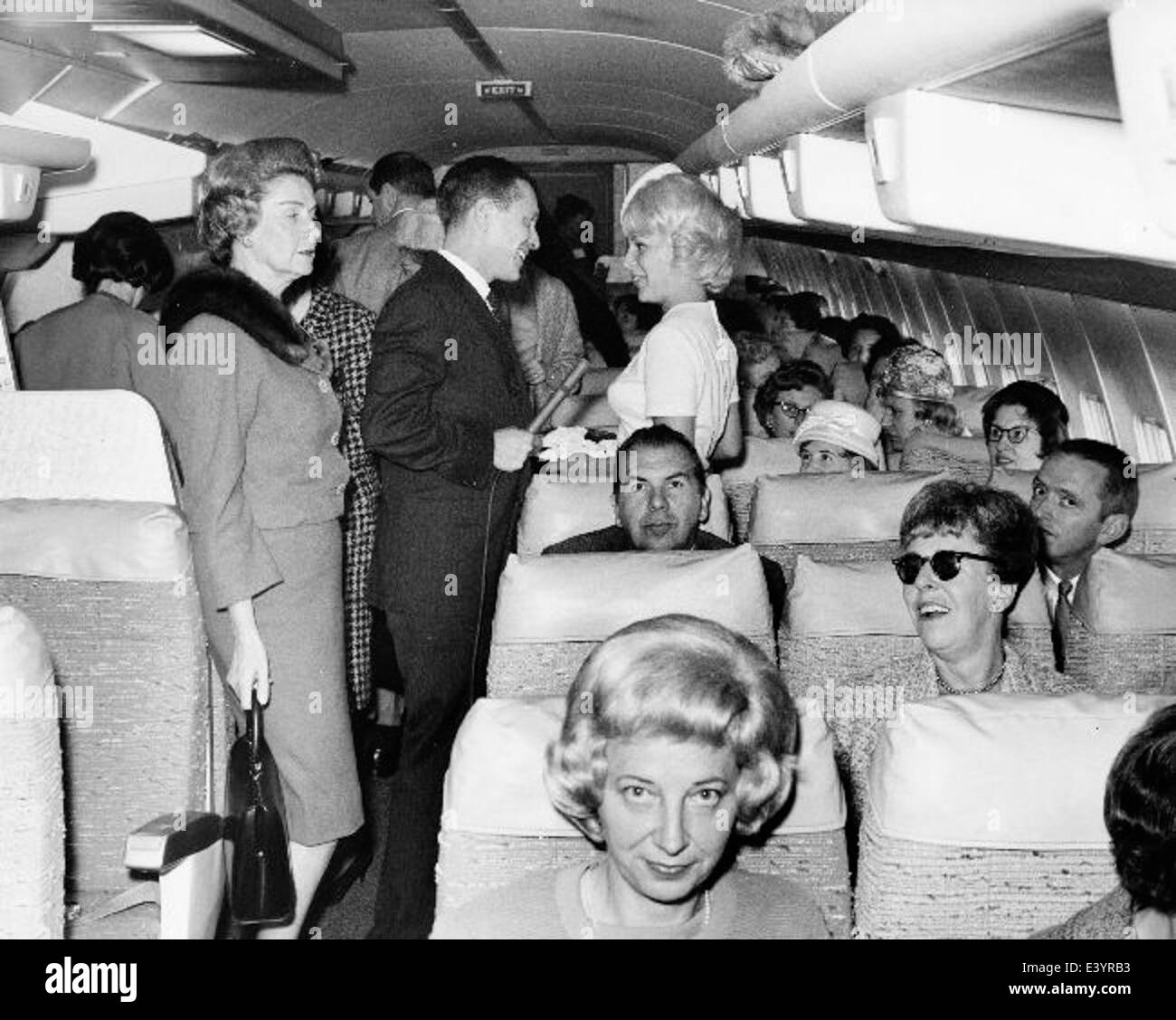 A photograph of a flight attendant aboard a Pacific Southwest Airlines ...