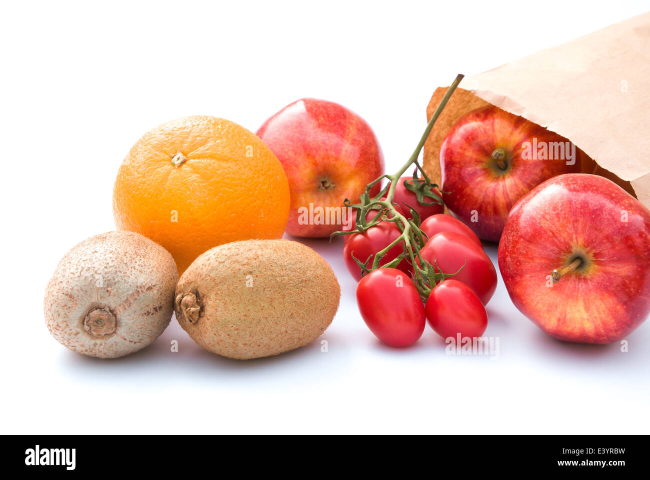 fruit and paper bag on white background Stock Photo - Alamy