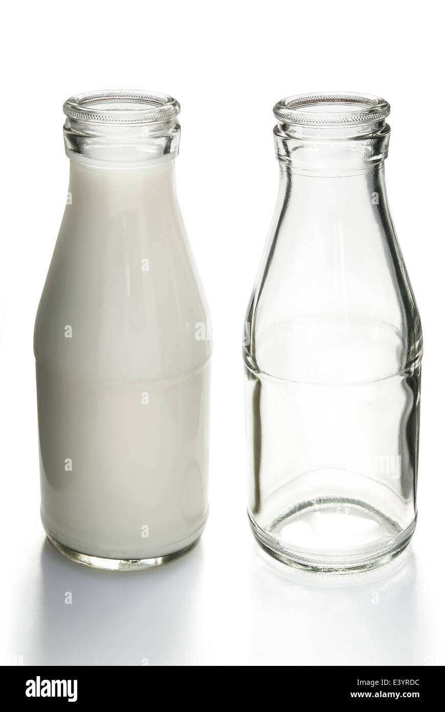 full and empty milk bottles with clipping path Stock Photo - Alamy