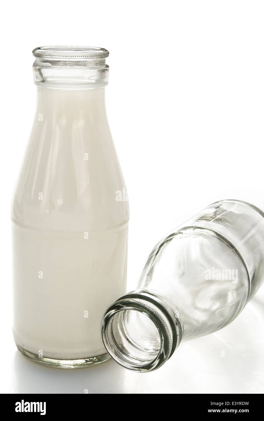 full and empty milk bottles with clipping path Stock Photo - Alamy