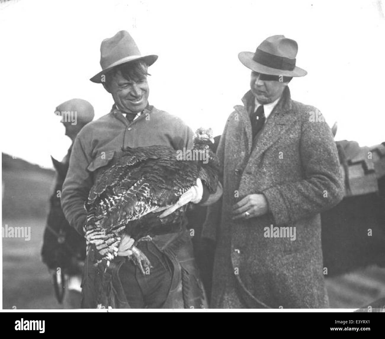 A photograph featuring Will Rogers and a member of the Babb family in ...