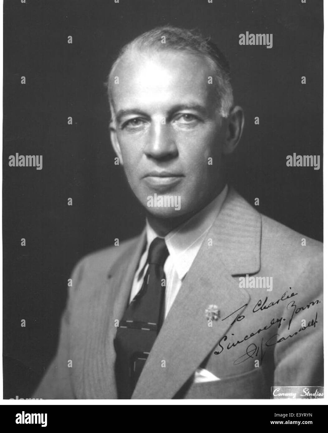 A photograph of J. Carswell, an aviation figure, captured in a ...