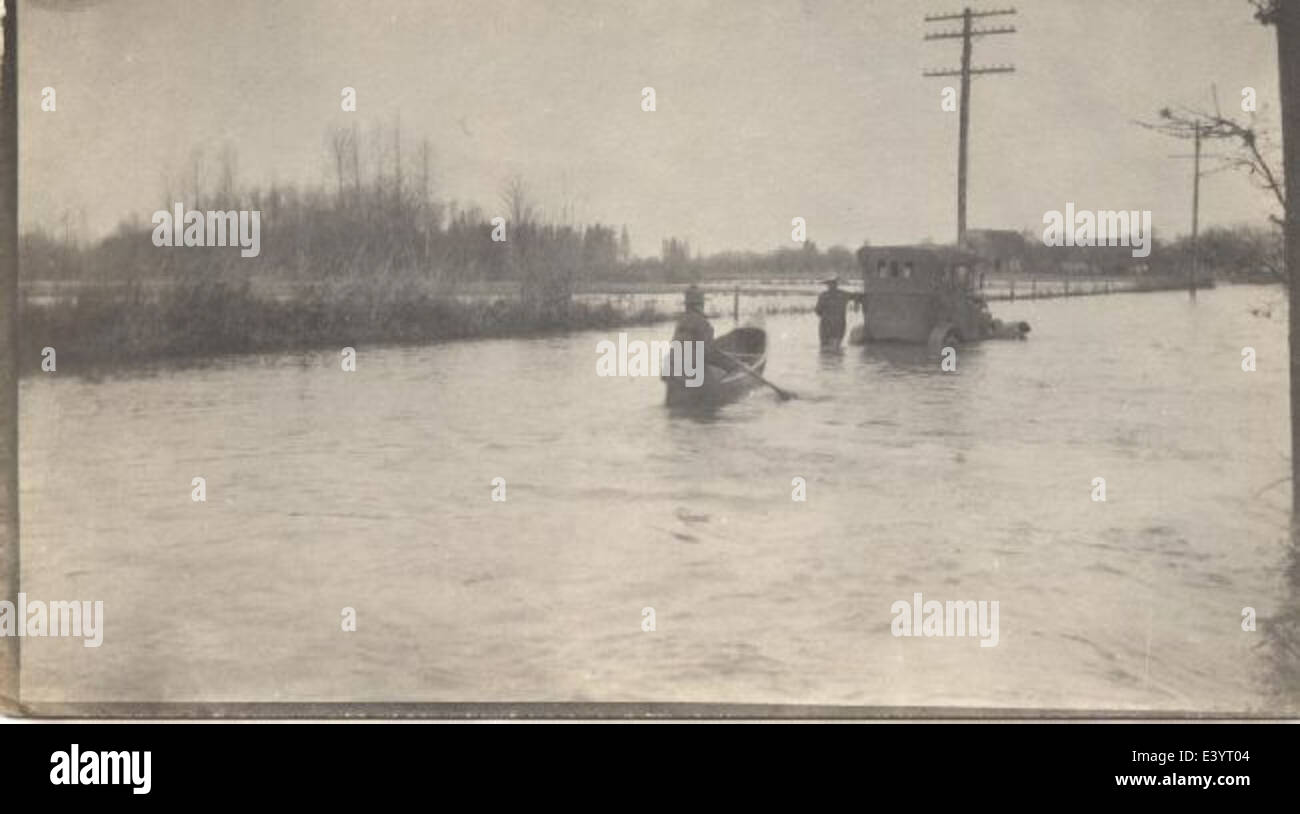 A photograph depicting a flooded area, likely showing the effects of ...