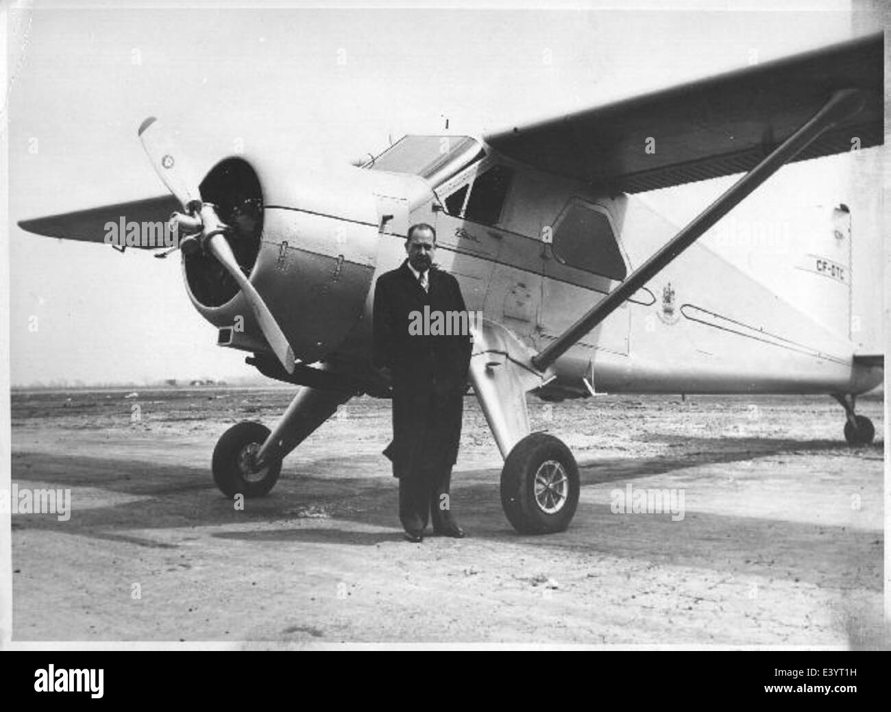 Portrait of Charles Babb, taken in 1950, with a beaver beside him ...