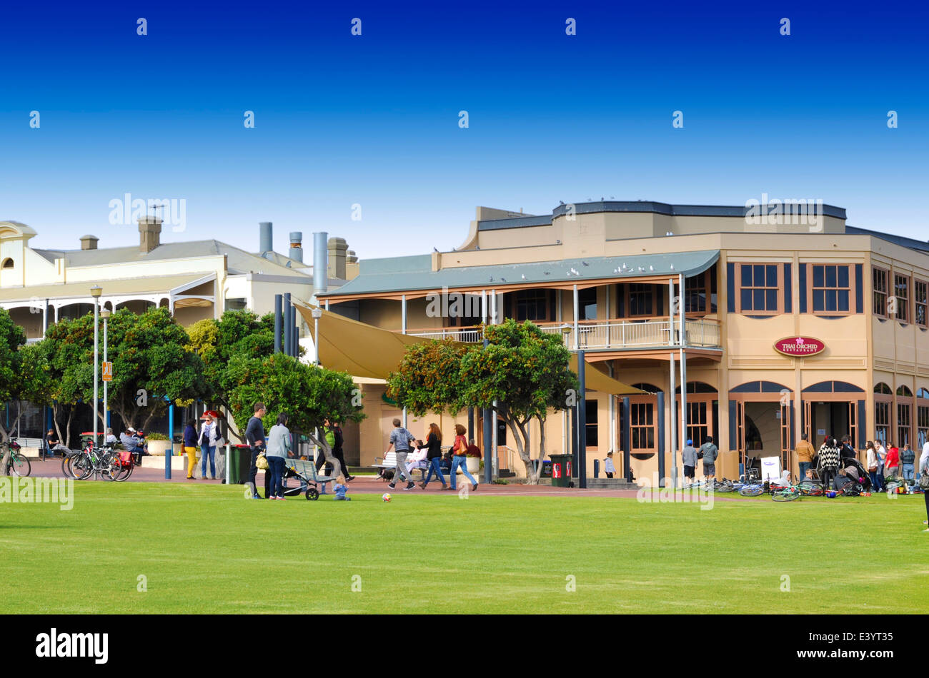 Crowd enjoying weekend gathering in Henley Square park, South Australia ...