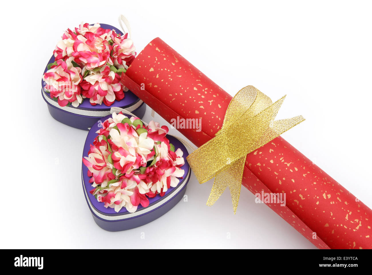 heart shape gift boxes and paper scroll with bow Stock Photo - Alamy