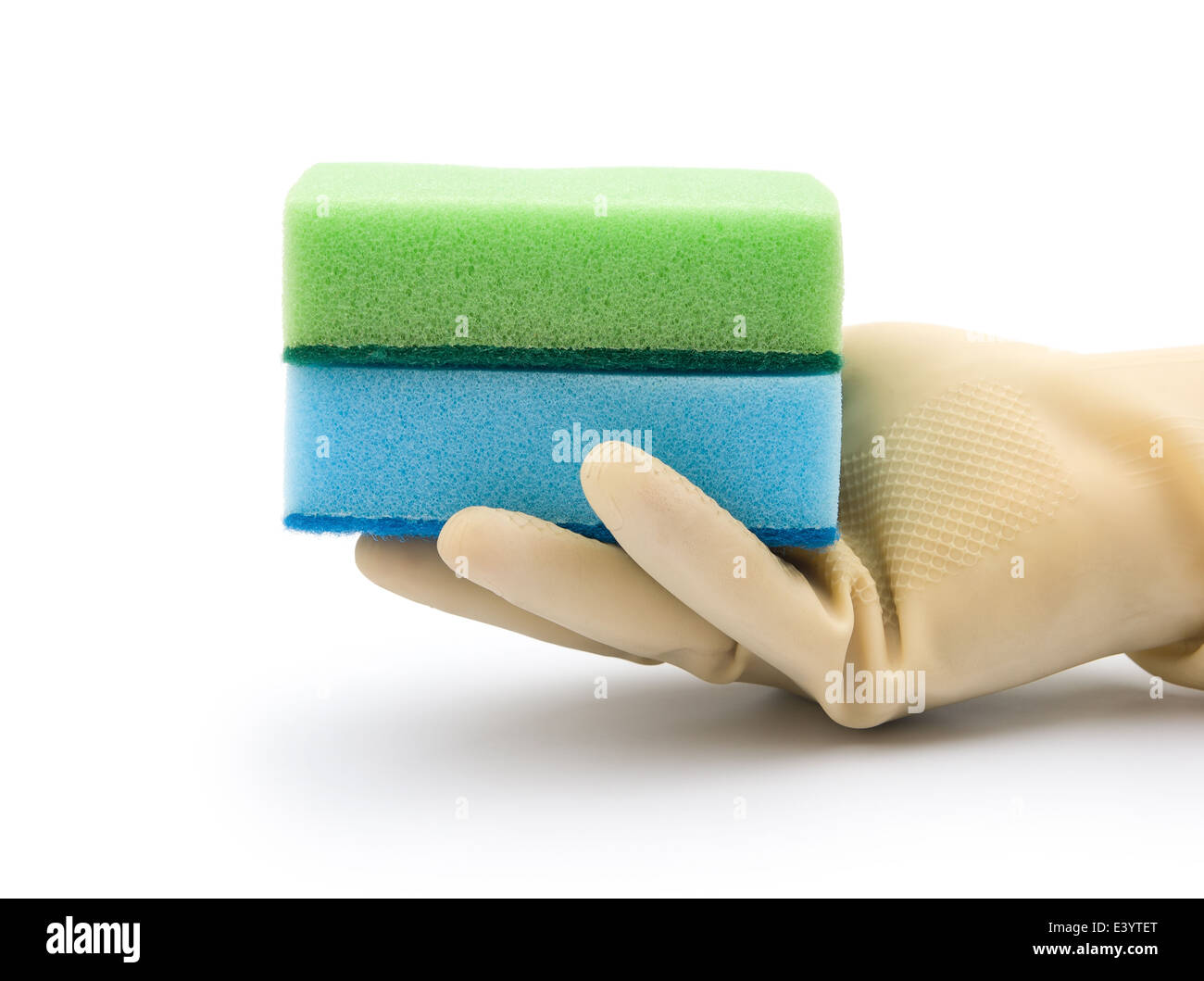 holding two double side cleaning sponges Stock Photo - Alamy
