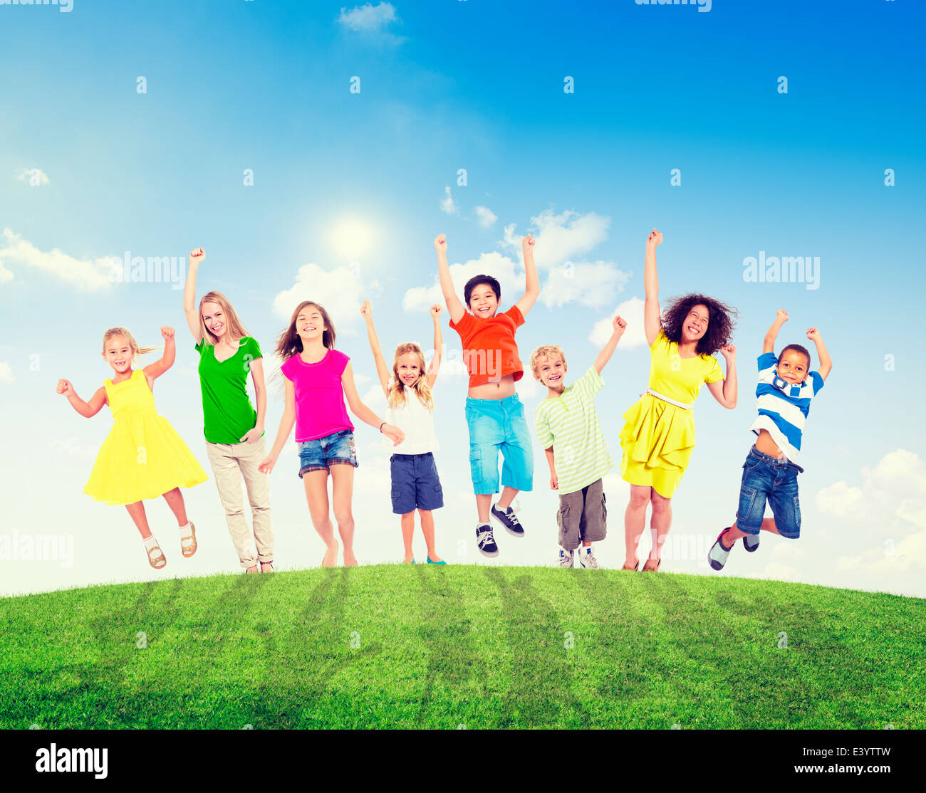 Cheerful Children and Women Raising Their Arms Outdoors Stock Photo - Alamy