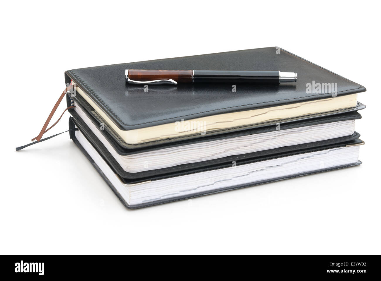pen and notebooks stack up Stock Photo - Alamy