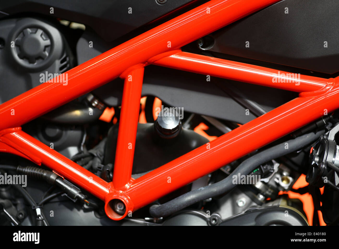Color detail of a red motorcycle frame Stock Photo - Alamy