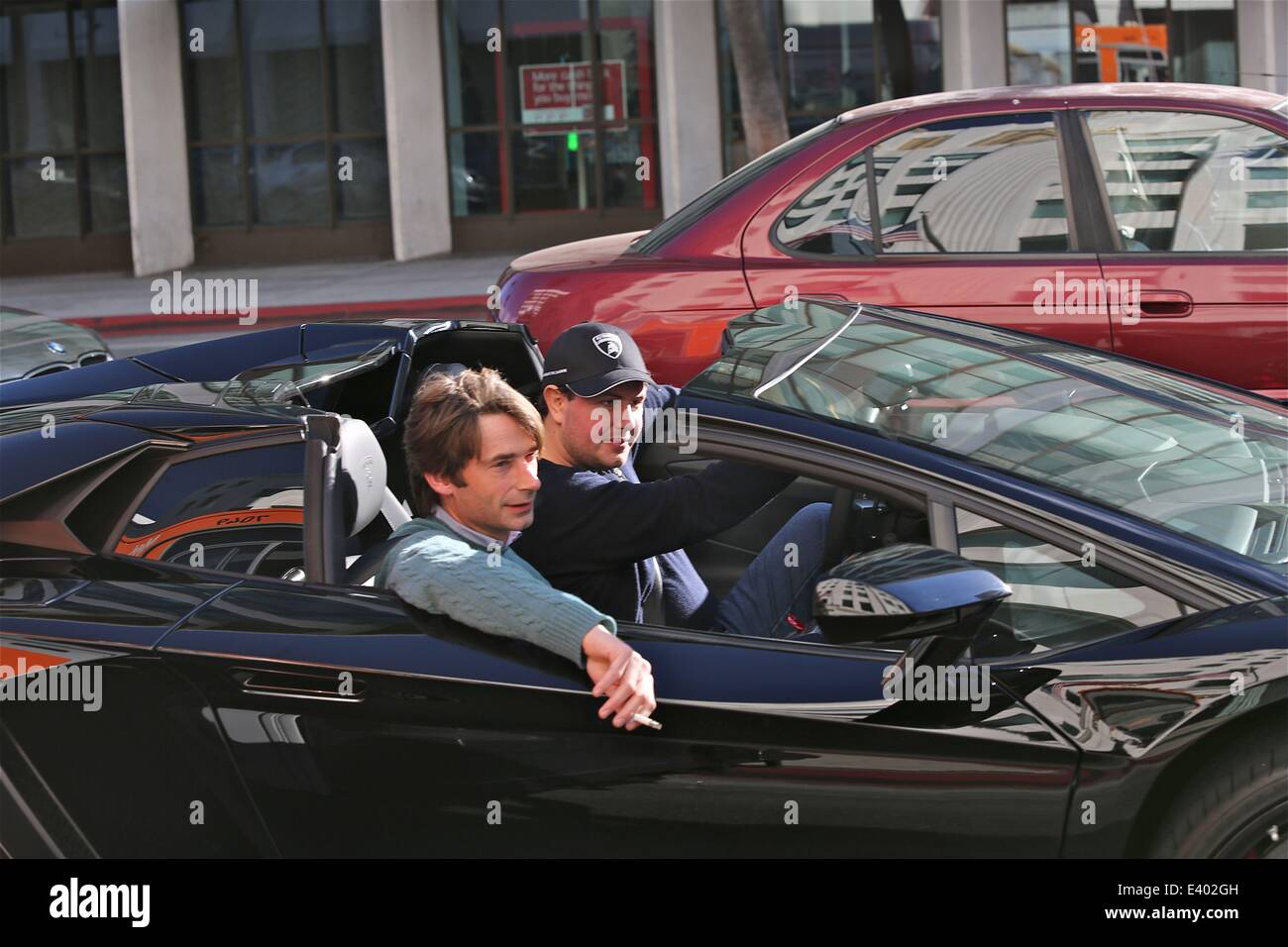 James Stunt driving in his black Lamborghini Aventador in Beverly Hills ...