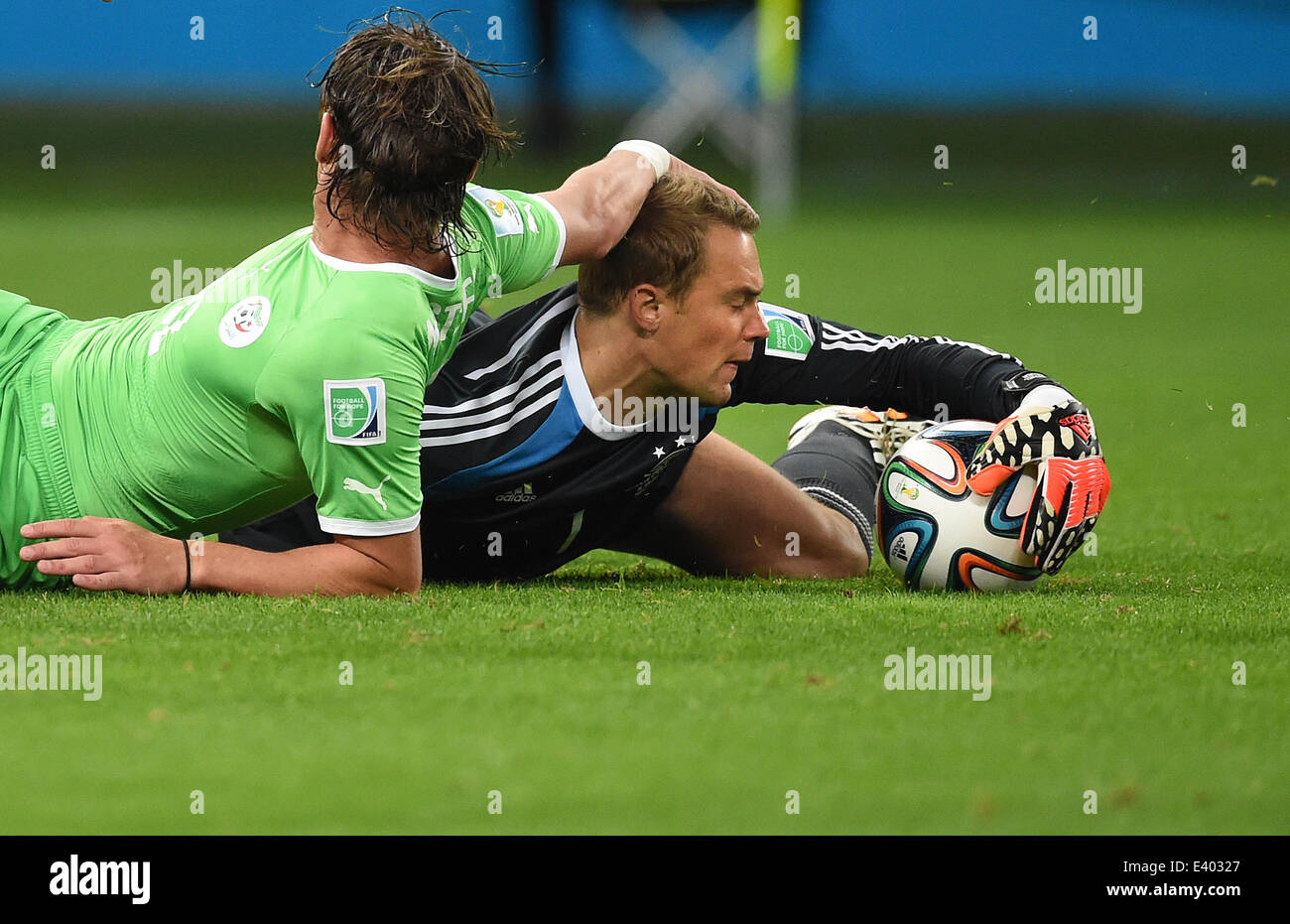 Porto Alegre, Brazil. 30th June, 2014. Germany's Manuel Neuer (R) and ...