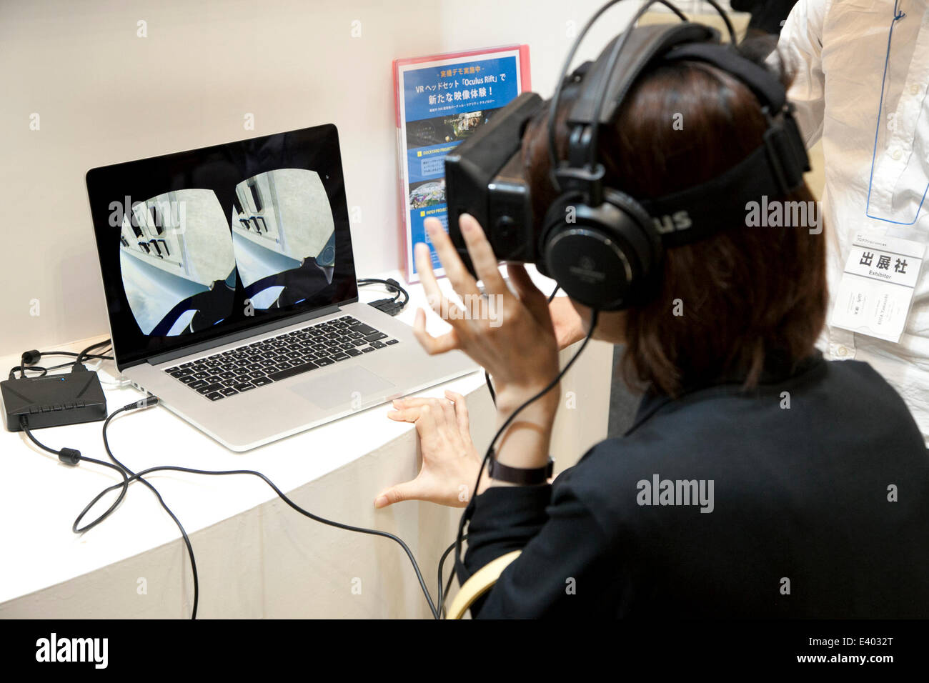 Tokyo, Japan. 2nd July, 2014. A woman tests the "Oculus Rift" simulator ...