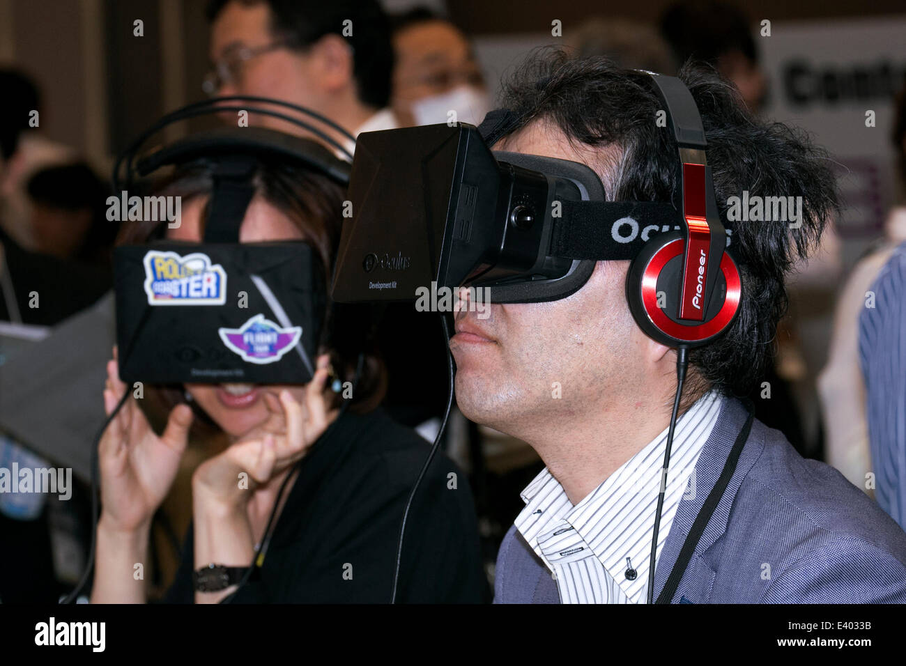 Tokyo, Japan. 2nd July, 2014. Visitors test the "Oculus Rift" simulator ...