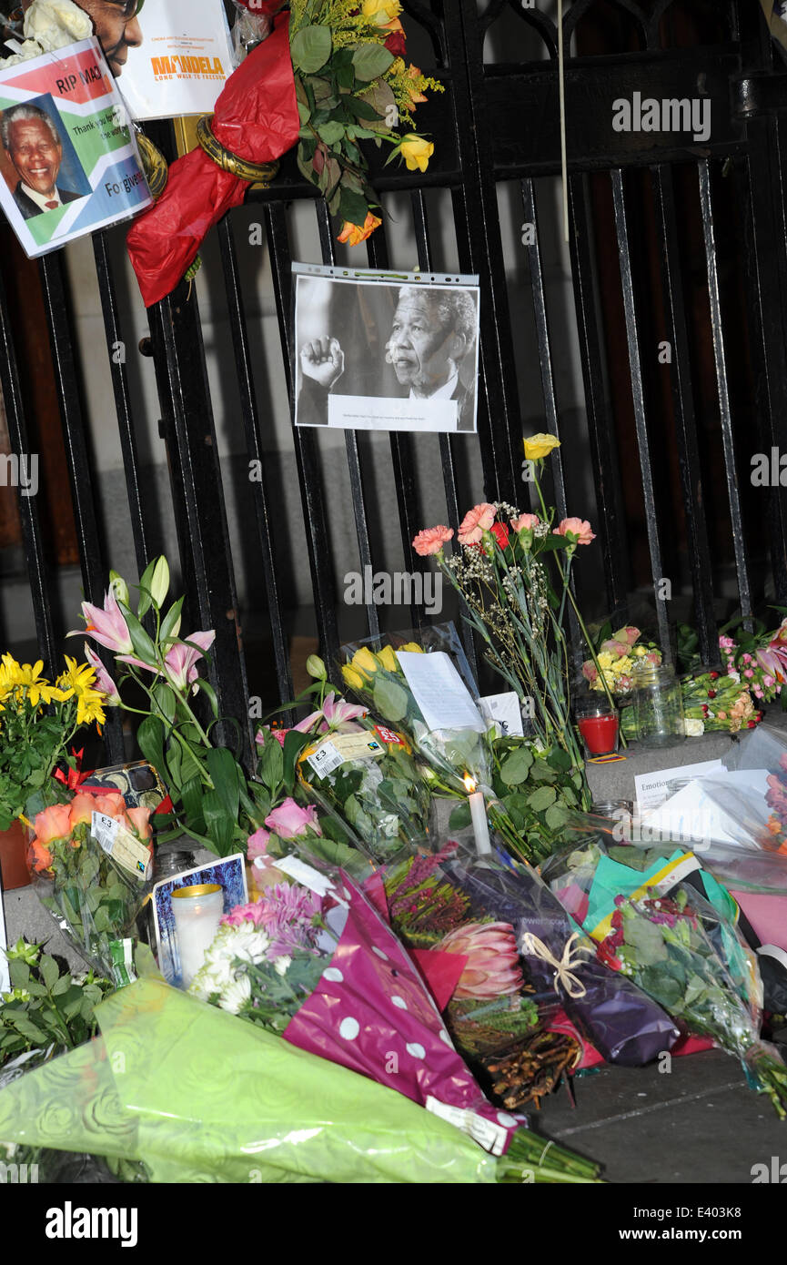 Tributes for Nelson Mandela are laid outside South Africa House ...