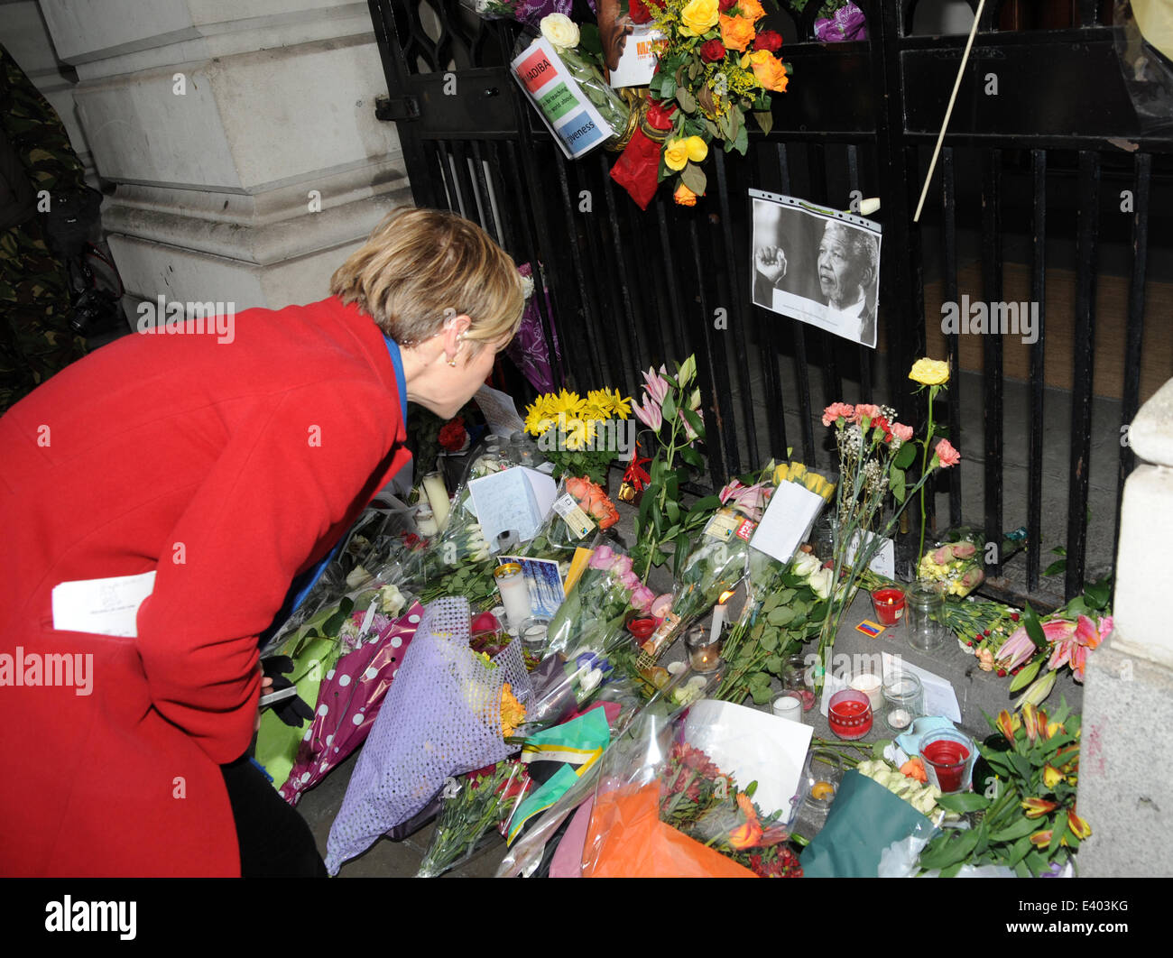 Tributes for Nelson Mandela are laid outside South Africa House ...