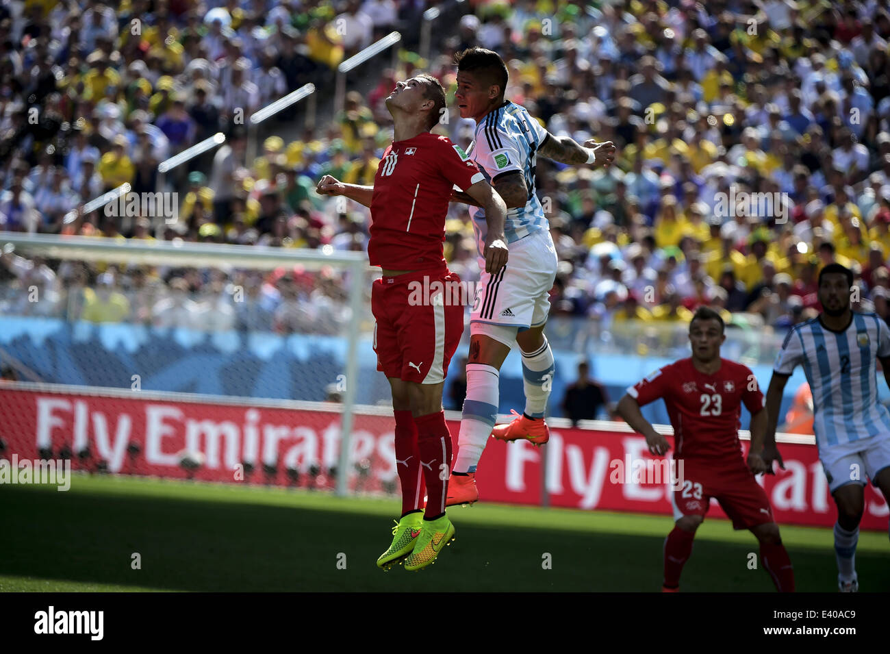 Sao Paolo, Brazil. 1st July, 2014. Granit Xkaha (10) and Fernando Gago ...