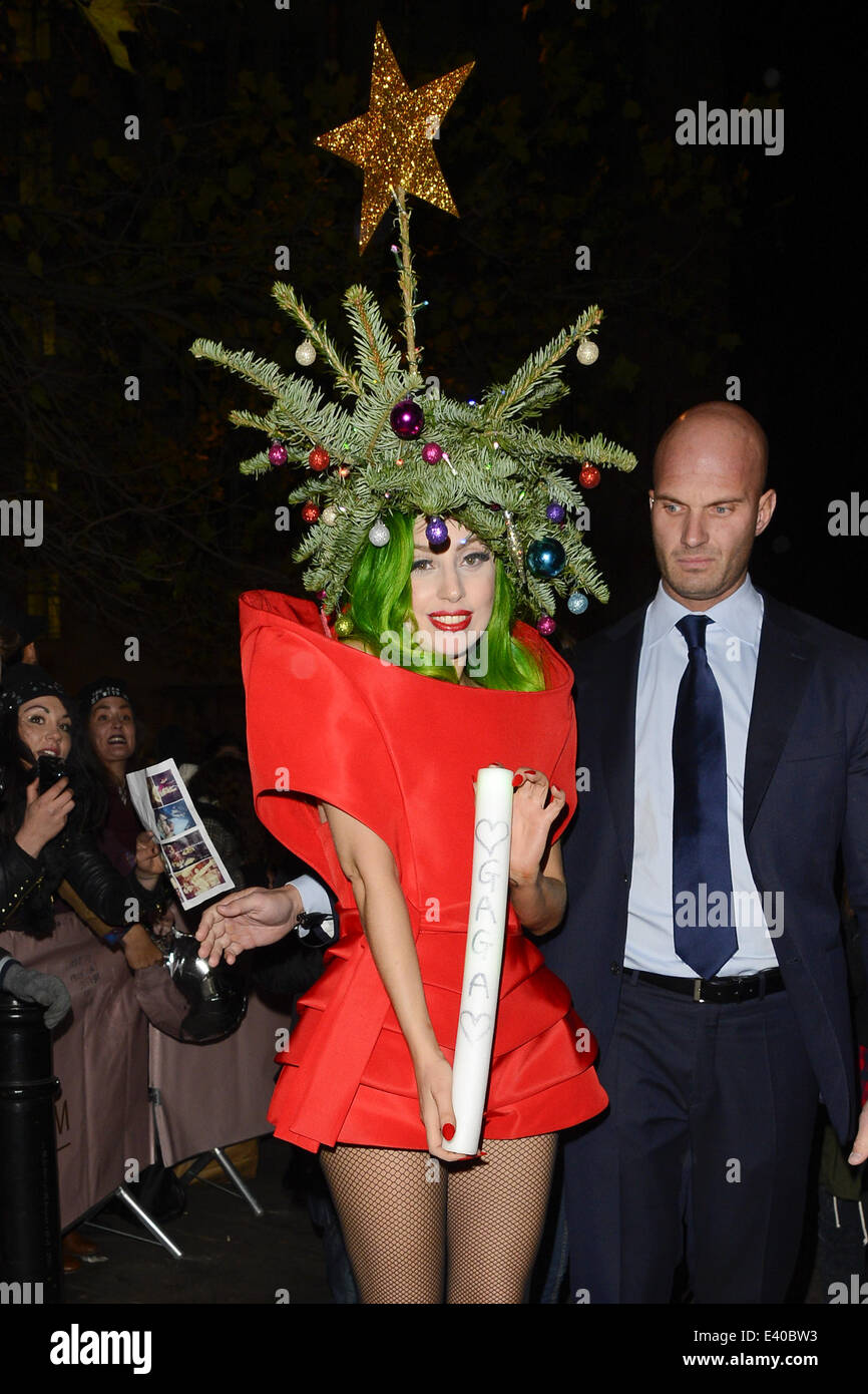 Lady Gaga dressed as a Christmas tree, arrives back to her hotel after ...