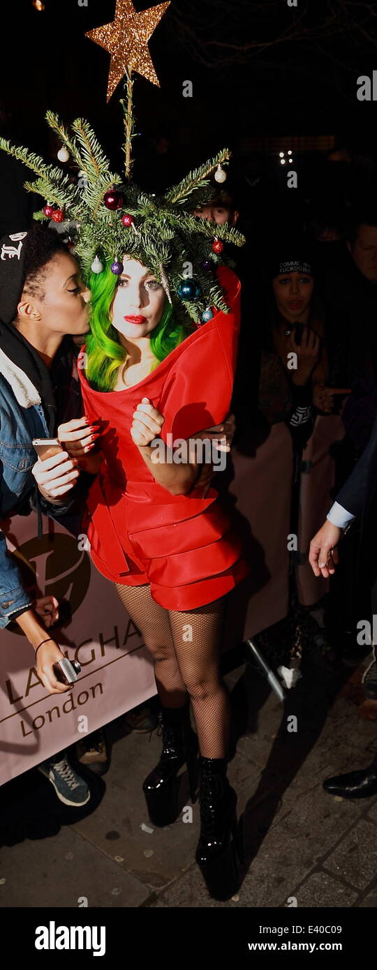 Lady Gaga dressed as a Christmas tree, arrives back to her hotel after ...
