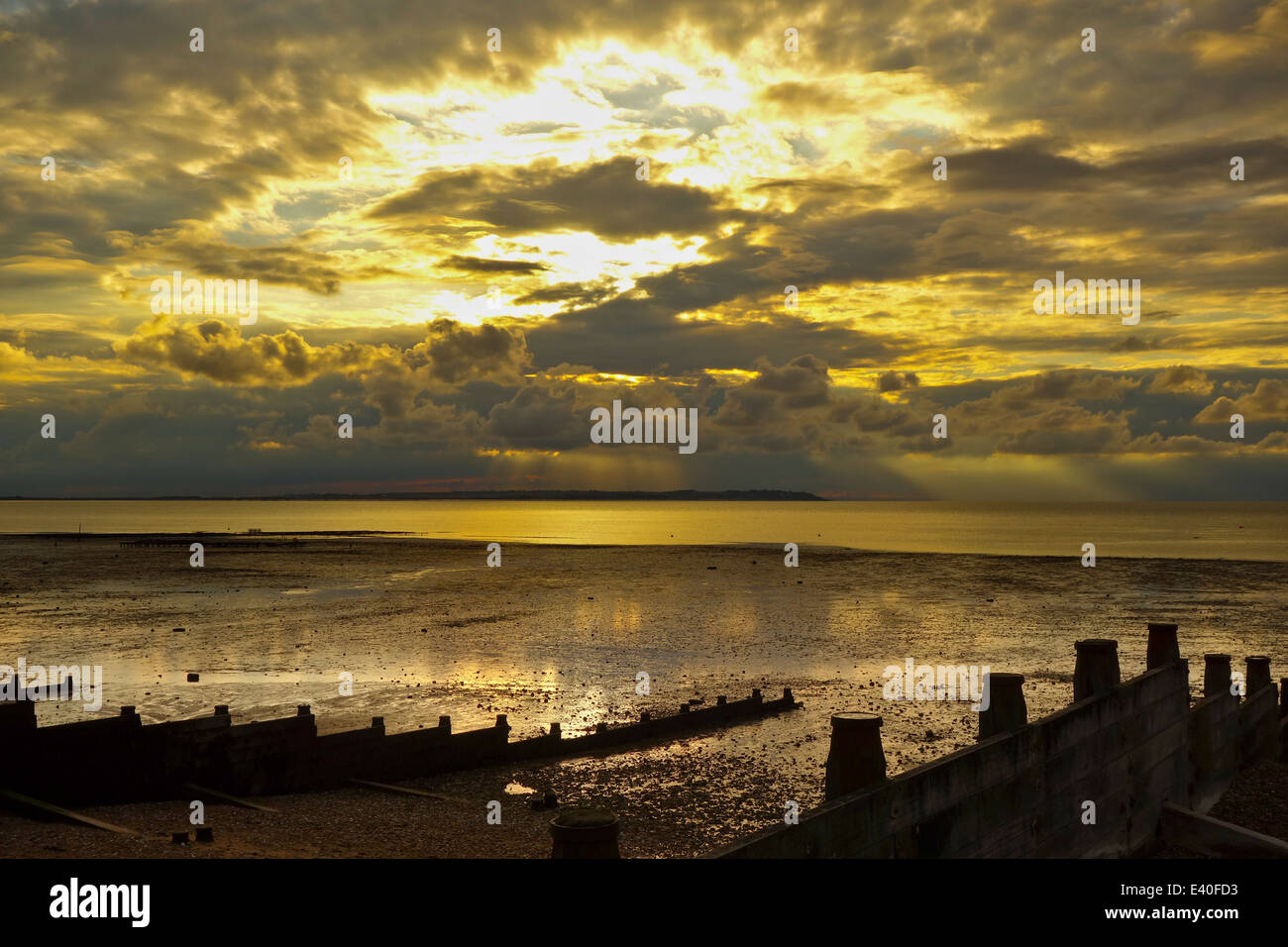 Sunset Whitstable beach Stock Photo - Alamy